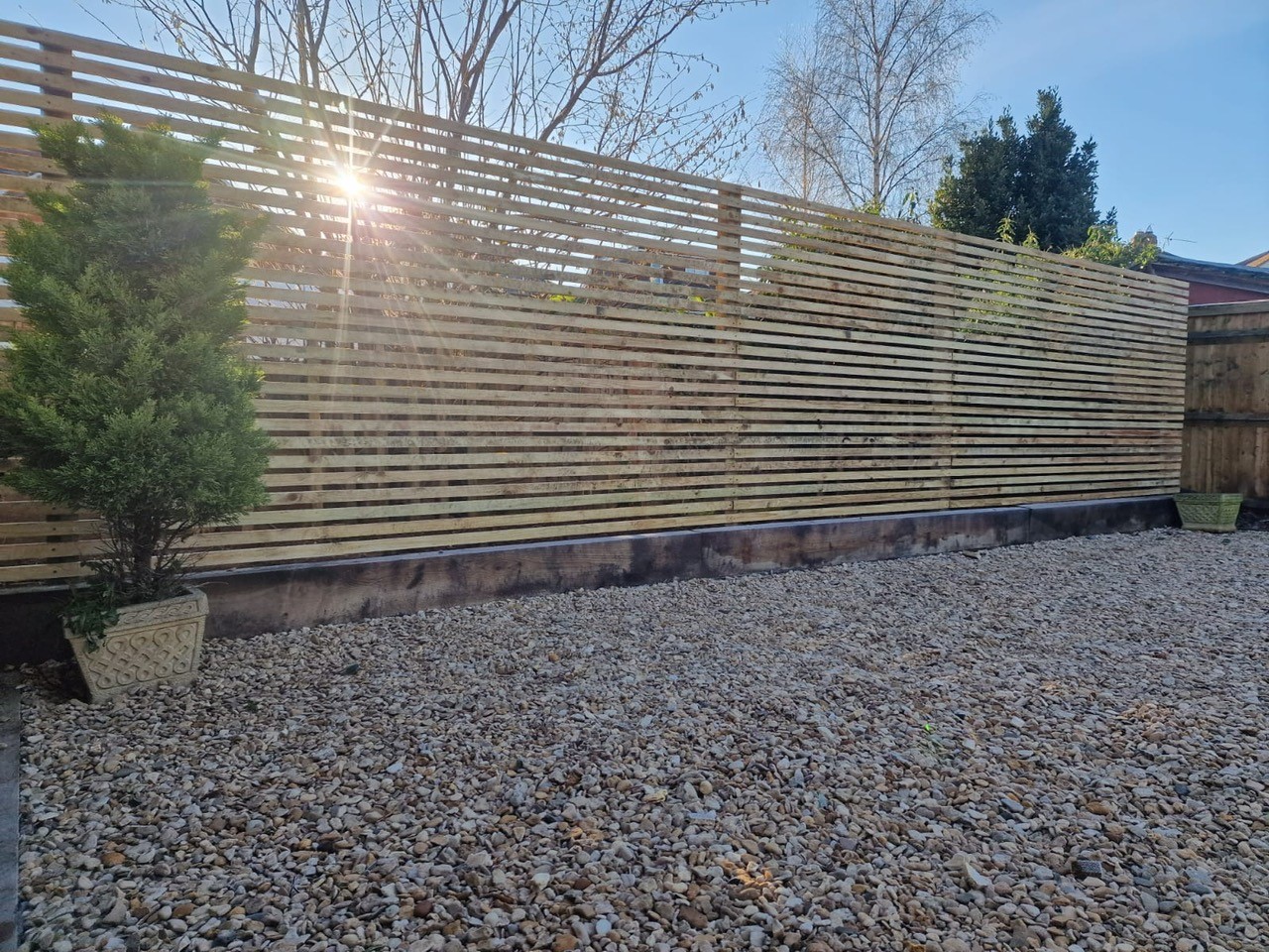 Railway Sleeper Wall & Slatted Fence Installed in Oxford